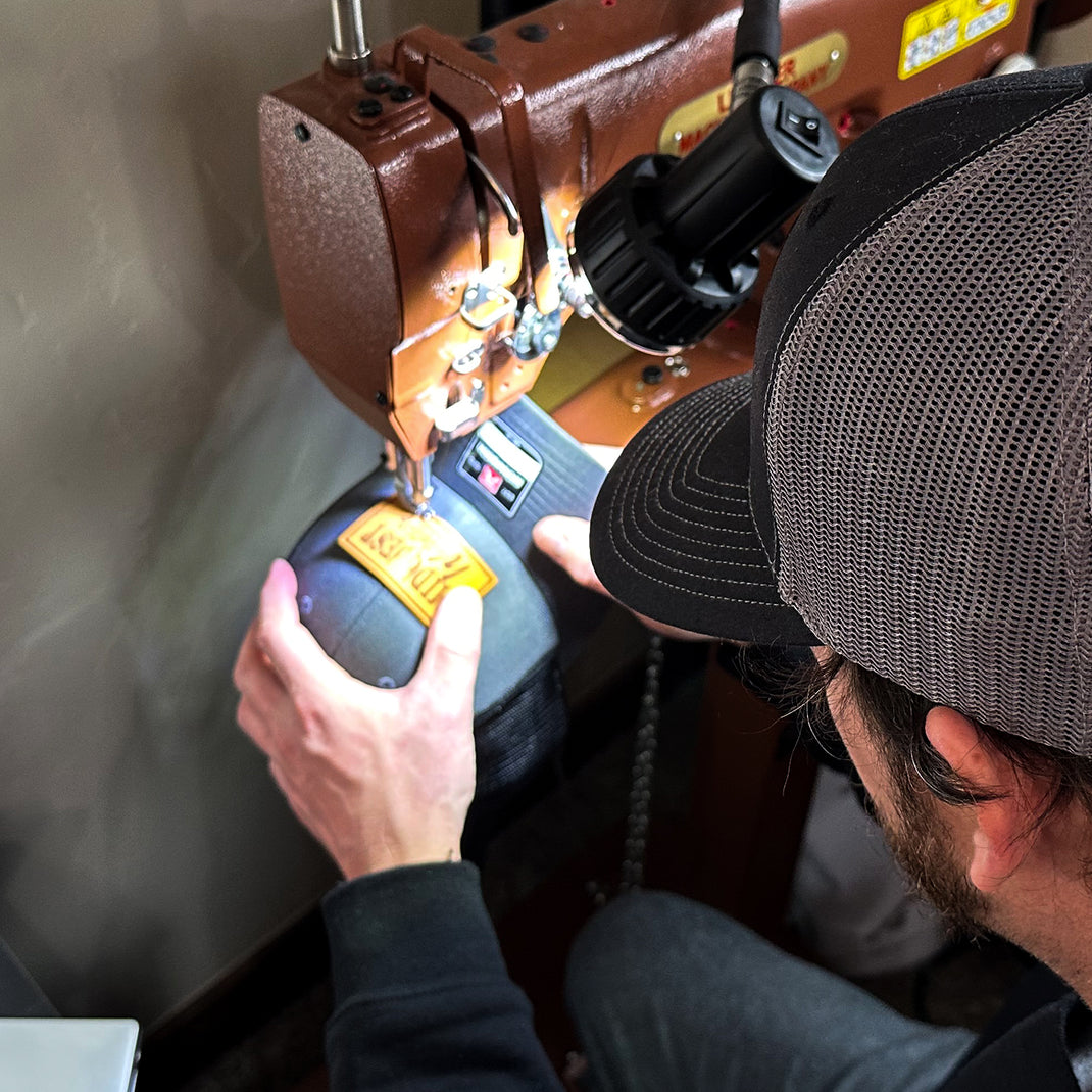 Mountain East – Leather Patch Hat Flat Bill – Outer Wings